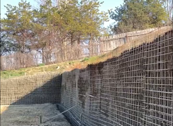 Consolidare taluz prin torcretare. C20/25. Grosime 12-15 cm. 2 randuri ...